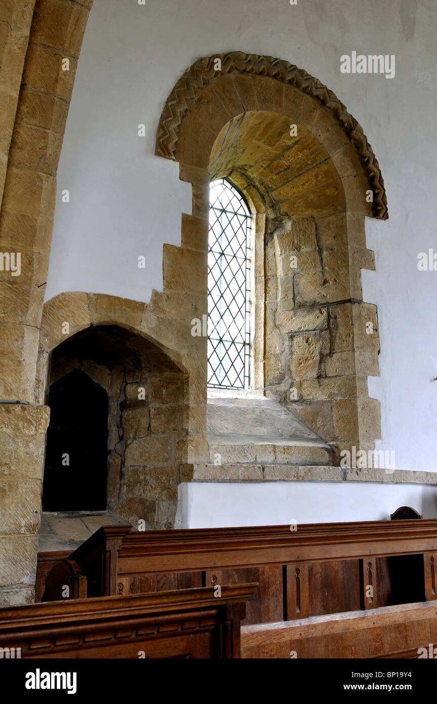 Norman window in St. Laurence`s Church, Oxhill, Warwickshire, England ...