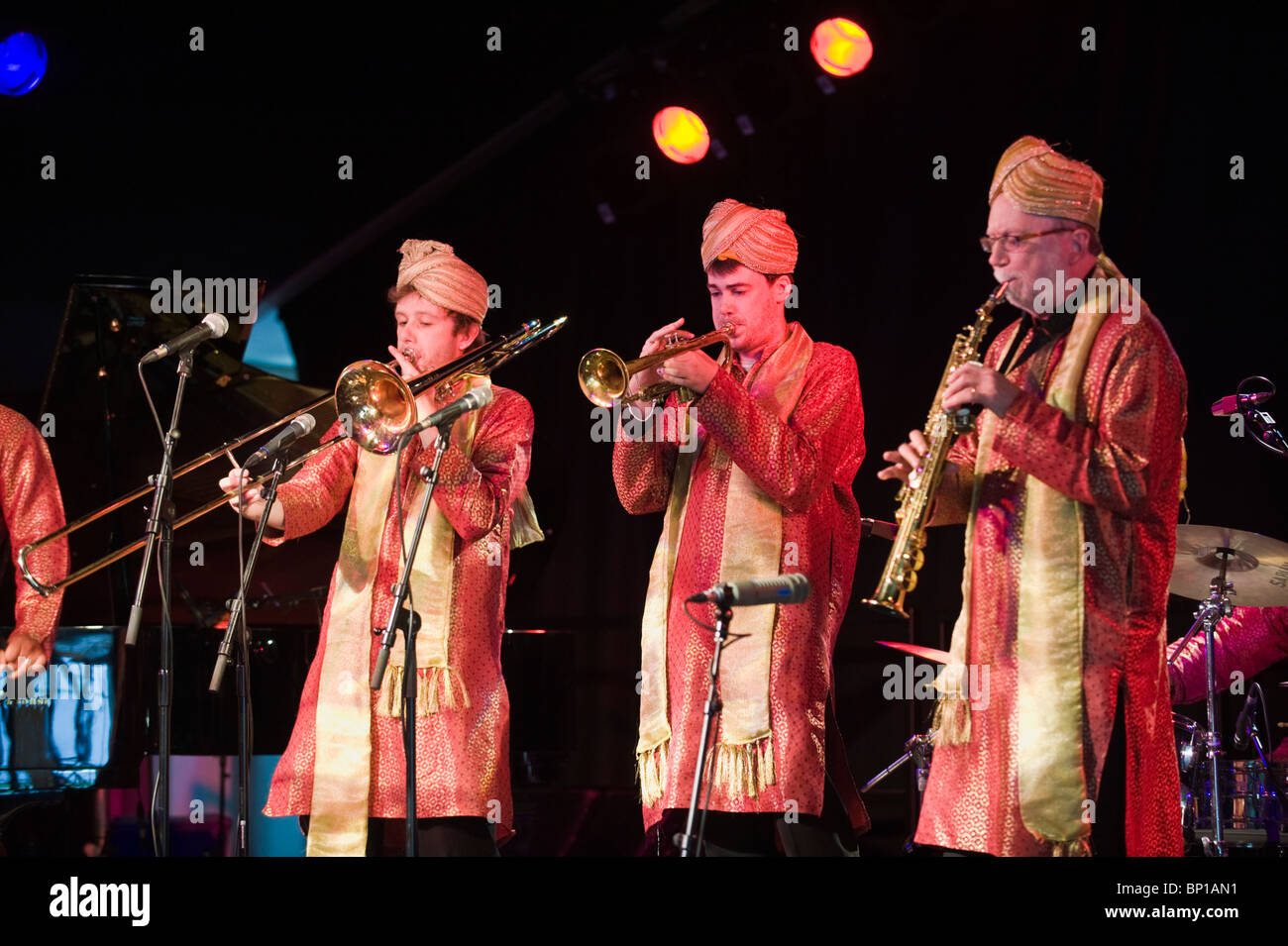 Indian man playing trumpet hi-res stock photography and images - Alamy