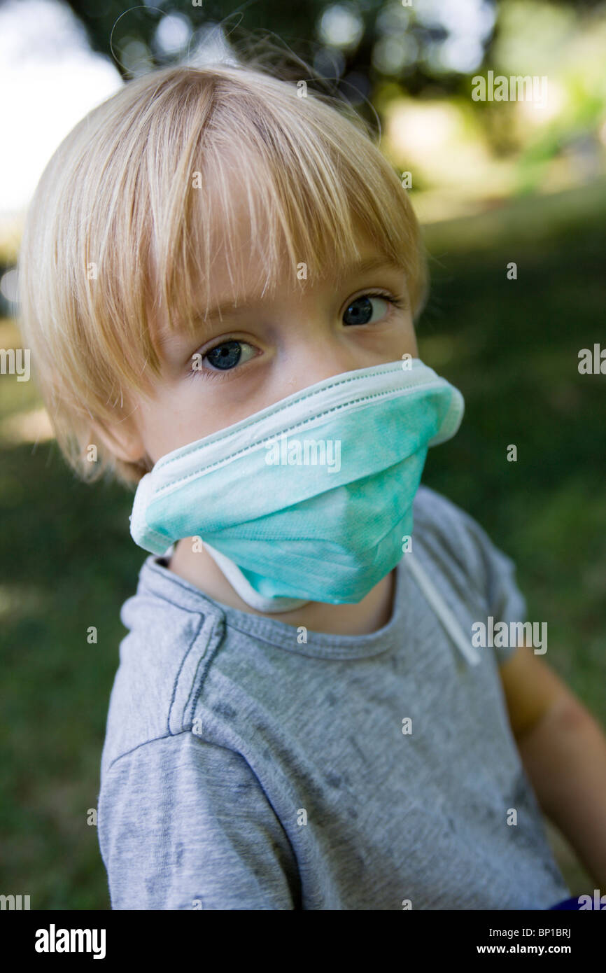 Little boy with protection mask Stock Photo - Alamy