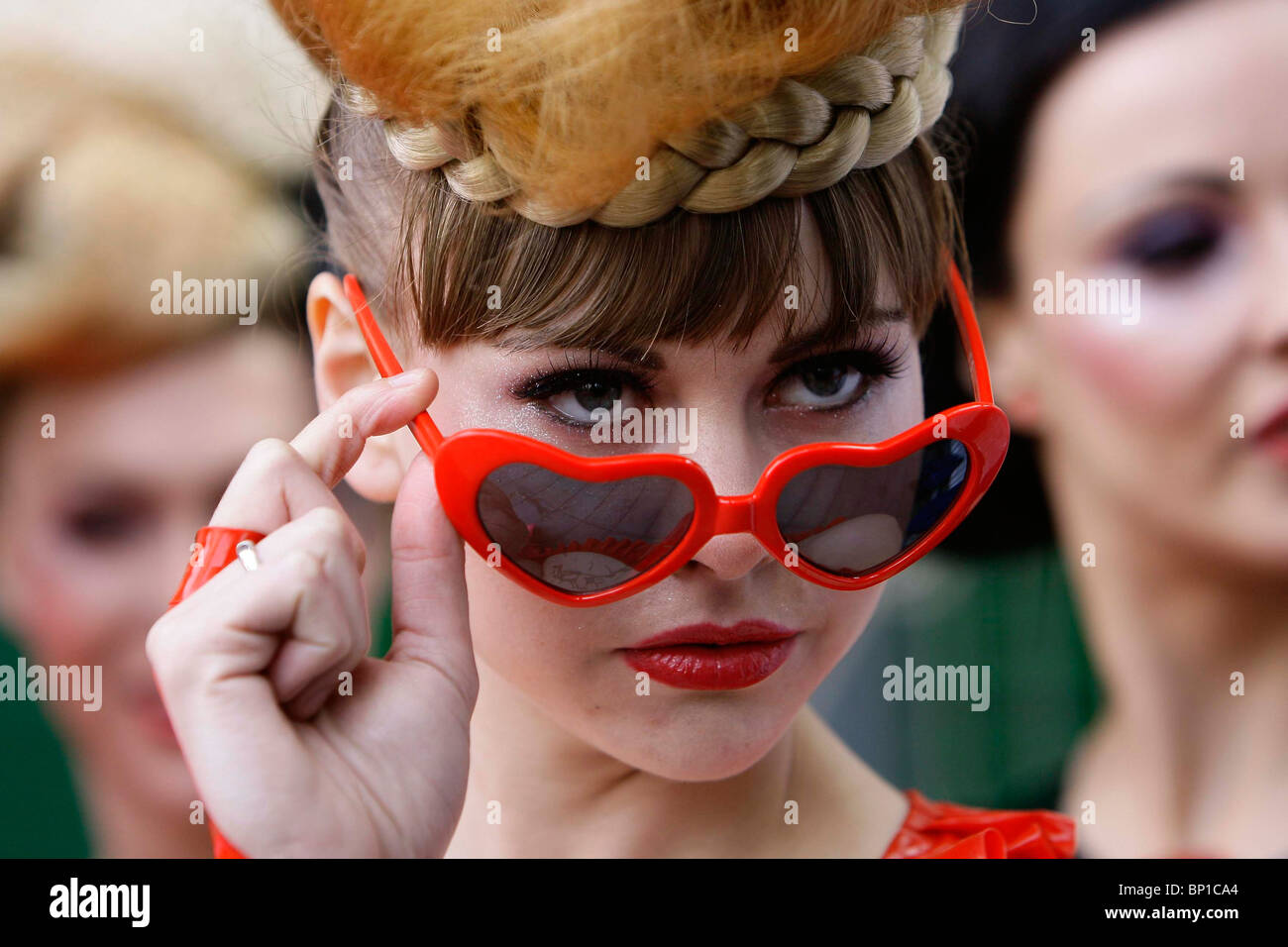 Models relax back stage on the first day of Alternative Fashion Week at ...