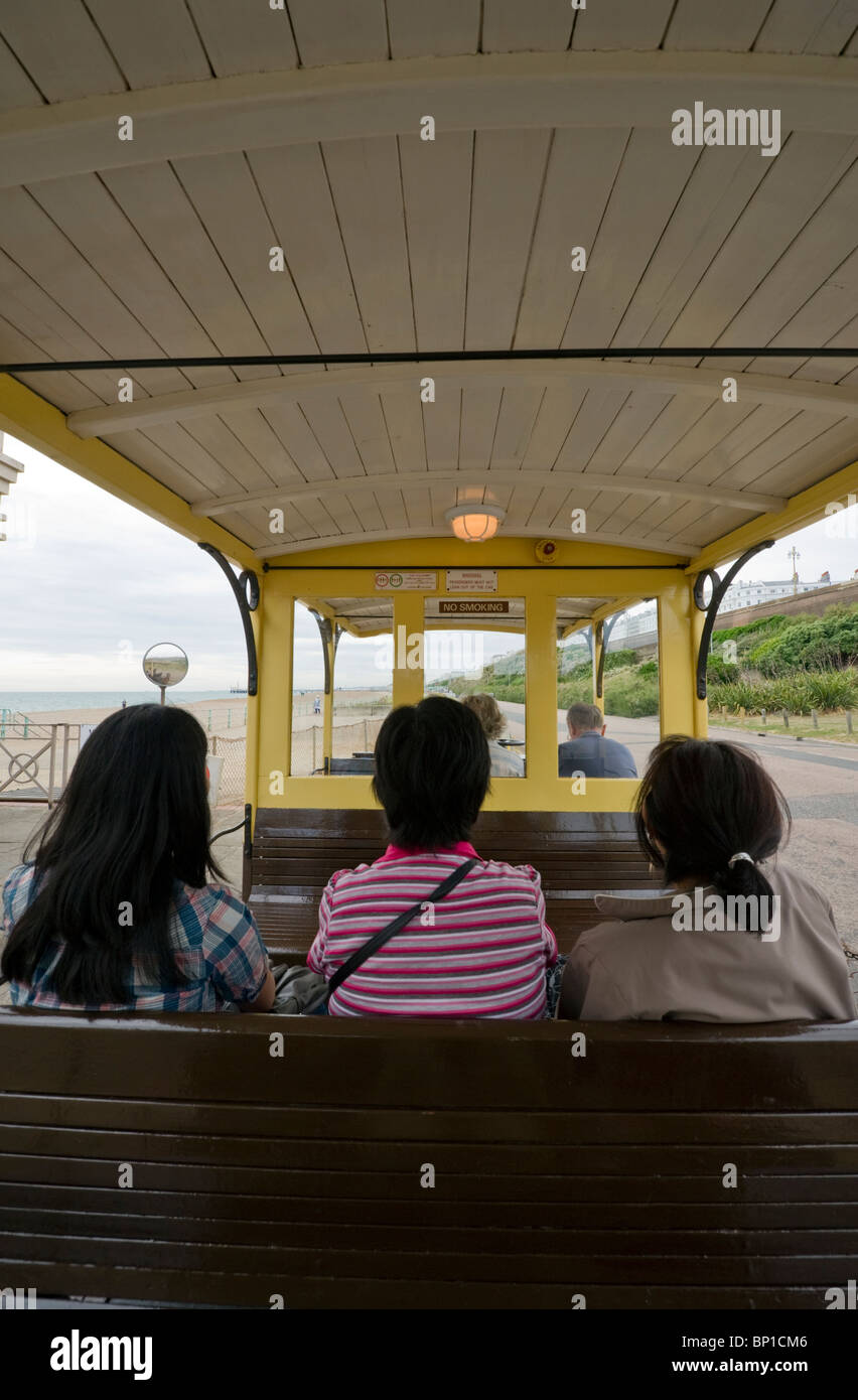 Railway passengers inside a train carriage on Volks electric railway ...