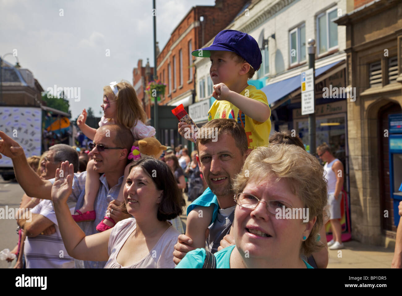 Crowd watching the carnival parade in Biggleswade, England Stock Photo ...
