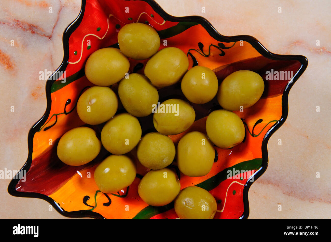 Green olive tapas in ceramic dish, Spain Stock Photo - Alamy