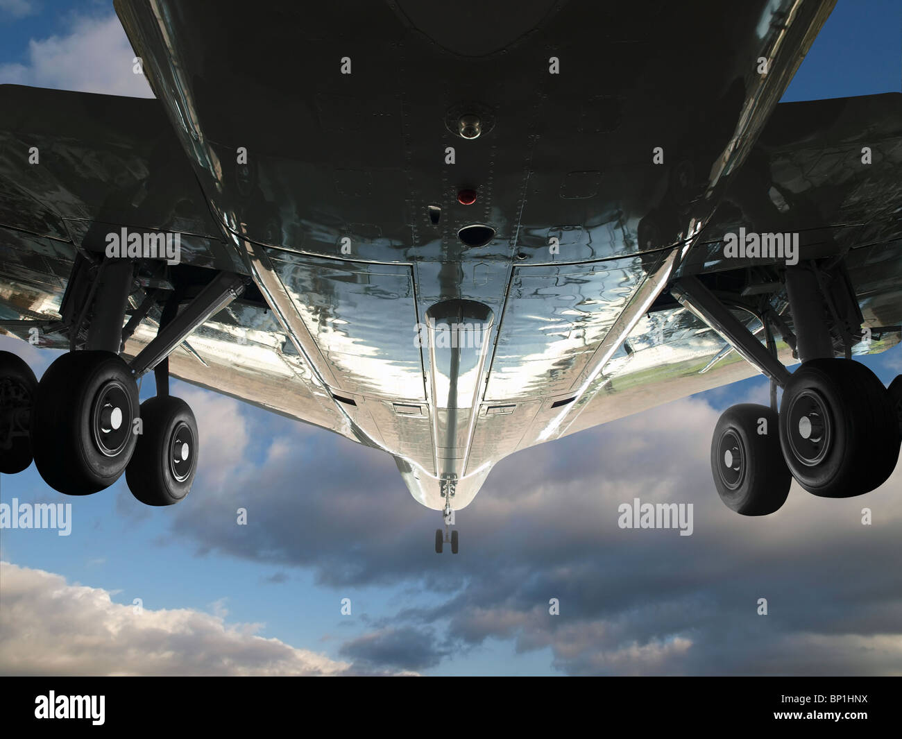 Wide angle up shot of a large jet in flight Stock Photo - Alamy