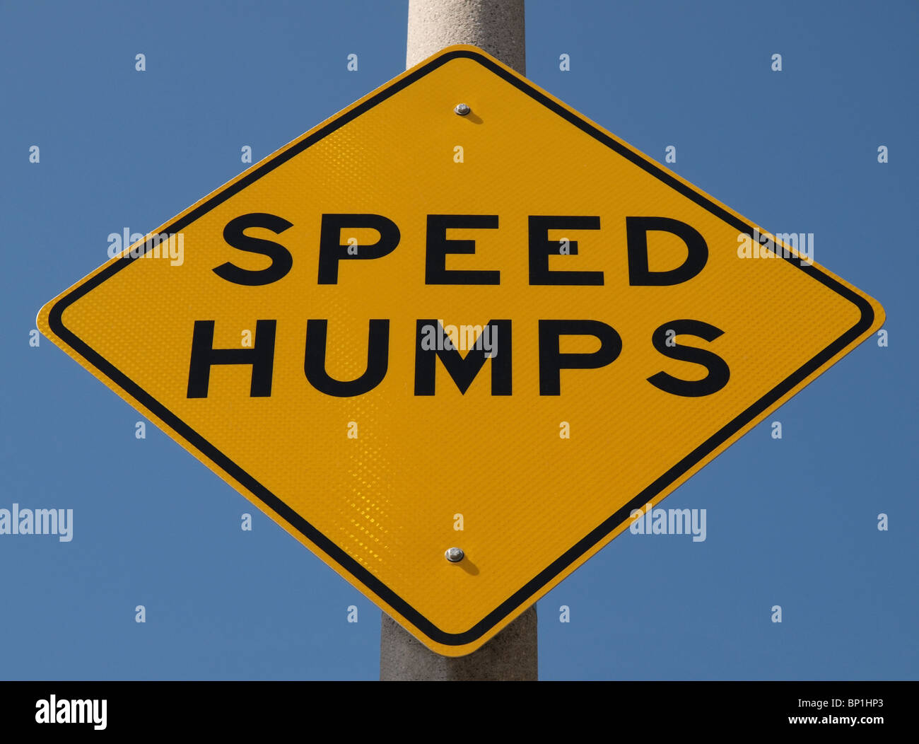 Speed Humps traffic sign warning motorists of hump action ahead Stock ...
