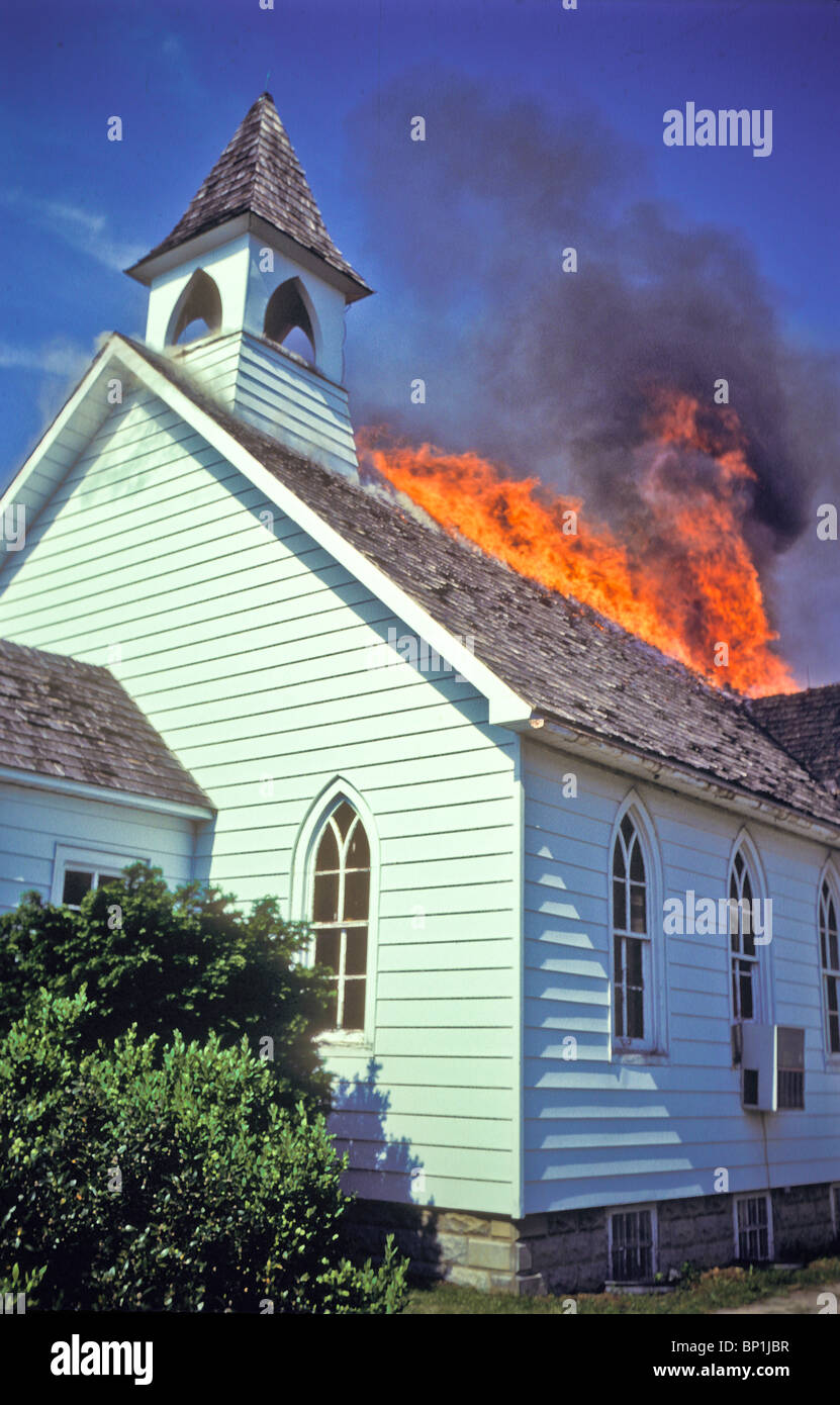 Volunteers fight church fire blaze Stock Photo - Alamy