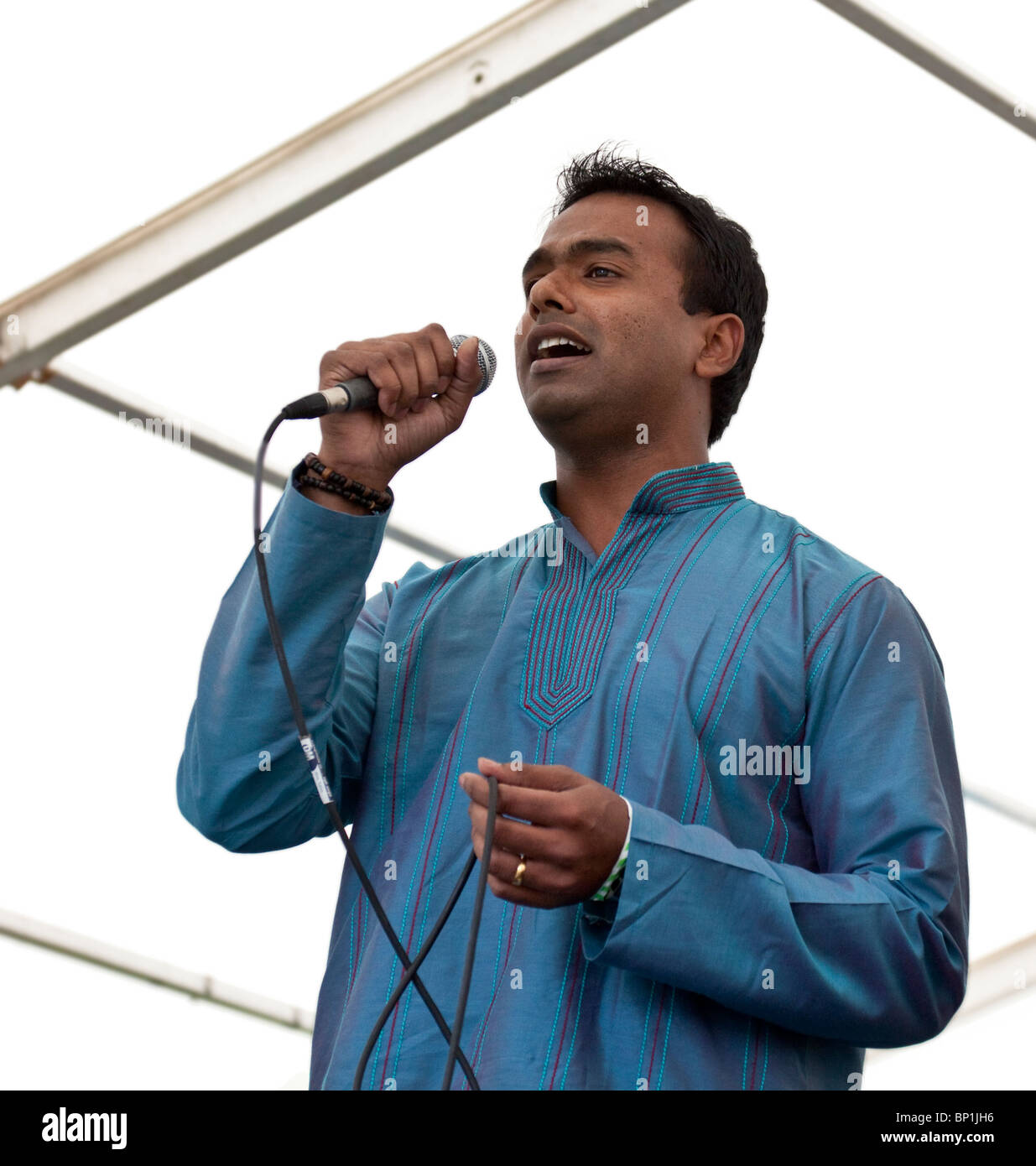 Male Asian singer at the 2010 Edinburgh Mela at Leith Links Stock Photo ...