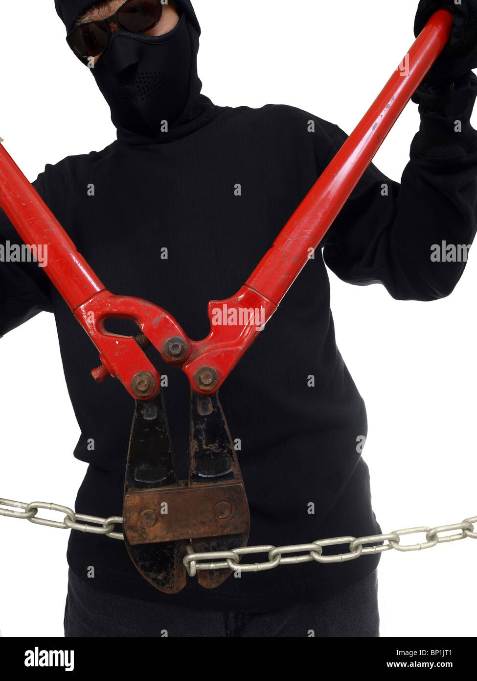 Masked man cutting a chain with well worn bolt cutters Stock Photo - Alamy