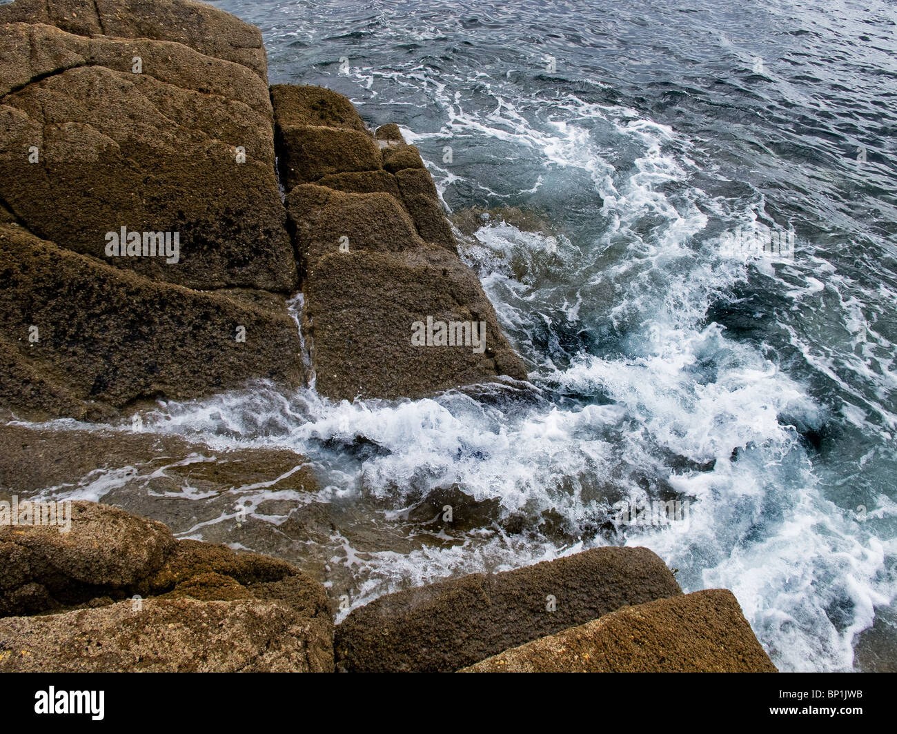 Granite rocks on the Cornish coast. Photo by Gordon Scammell Stock ...