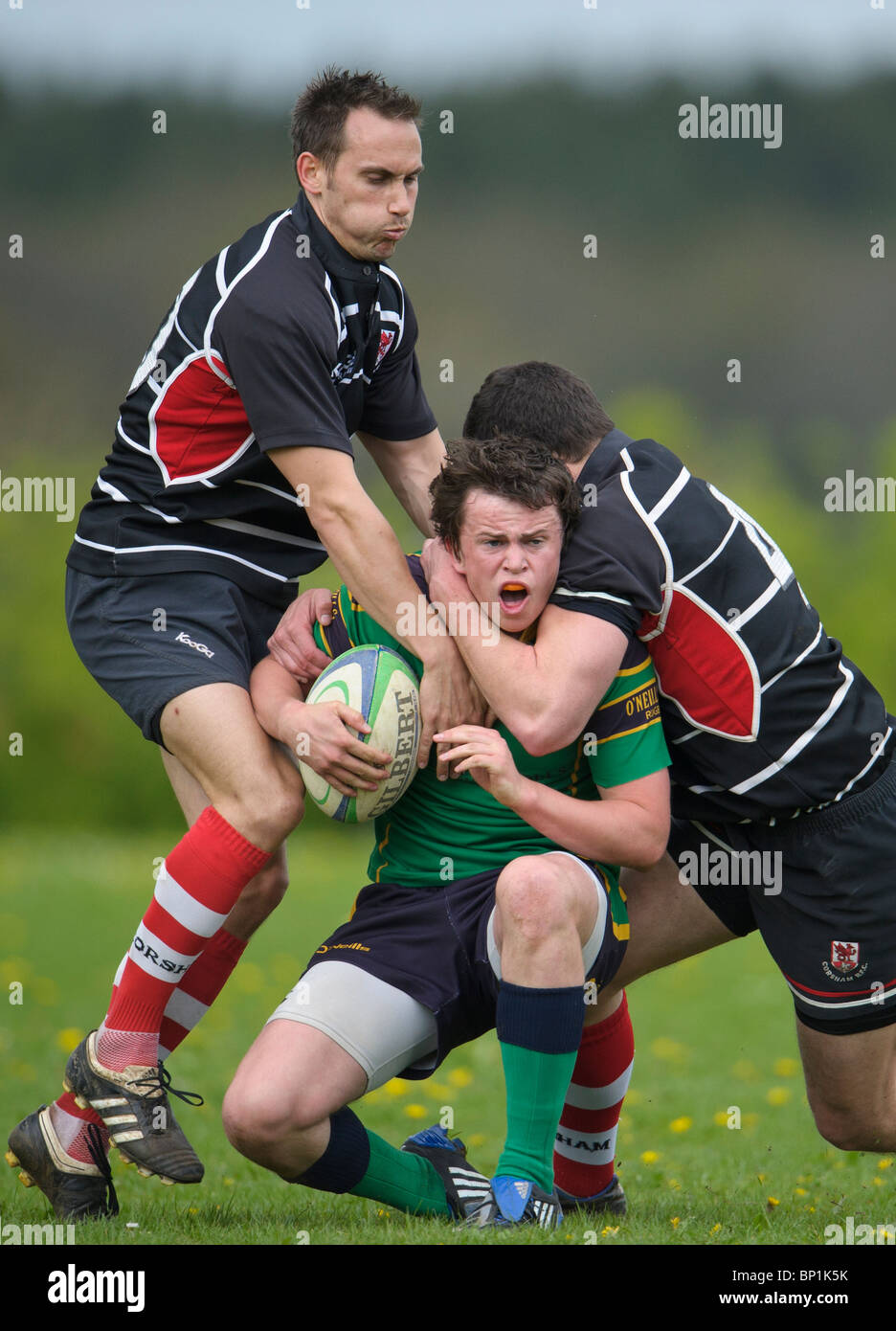 Rugby player illegal tackle hi-res stock photography and images - Alamy