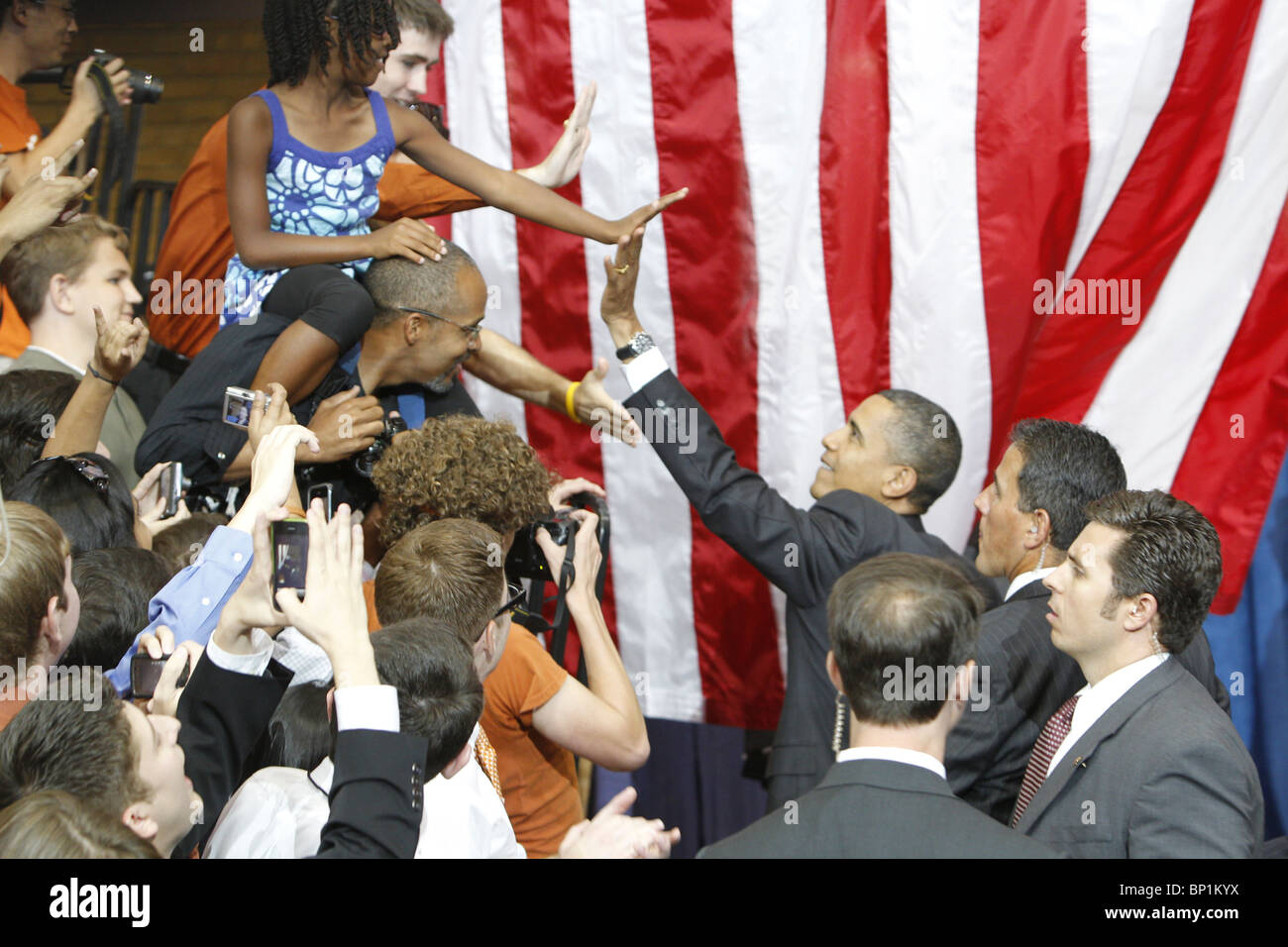 U.S. President Barack Obama greets audience members at the University ...