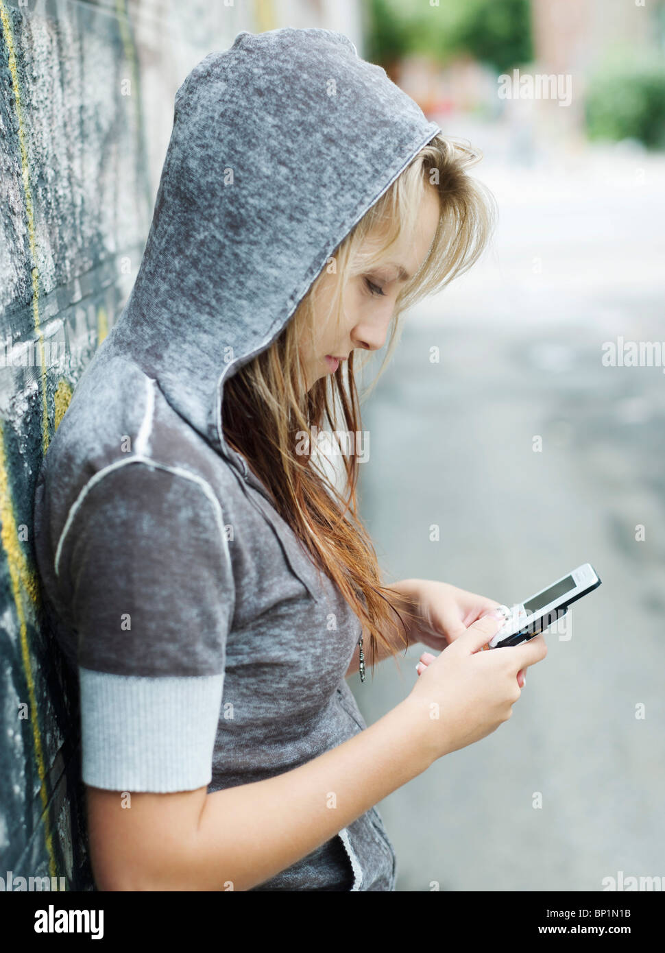 Teenage girl using mobile phone Stock Photo - Alamy