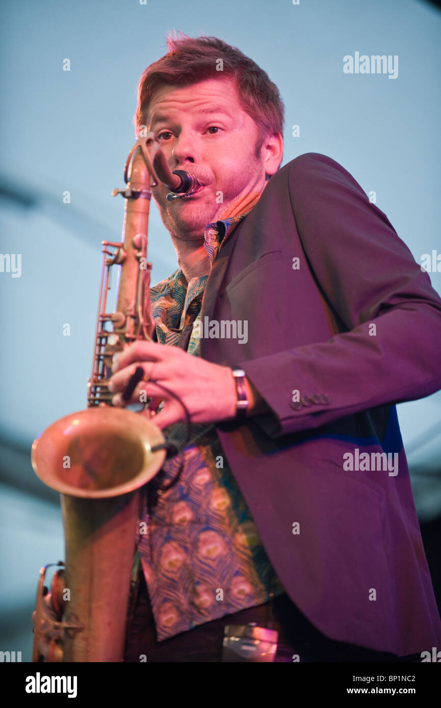 Magnus Lindgren playing sax with his band on stage at Brecon Jazz ...