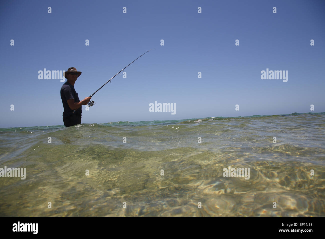 A fisherman in the Indian Ocean, Denham, Australia Stock Photo - Alamy