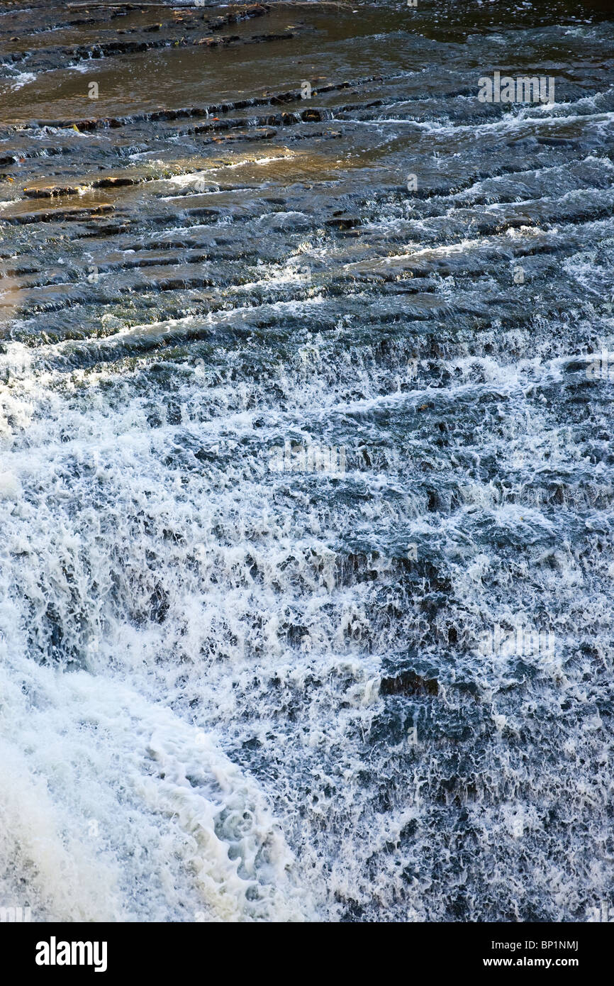 The white water rapids as they cascade over the rock formation at the ...