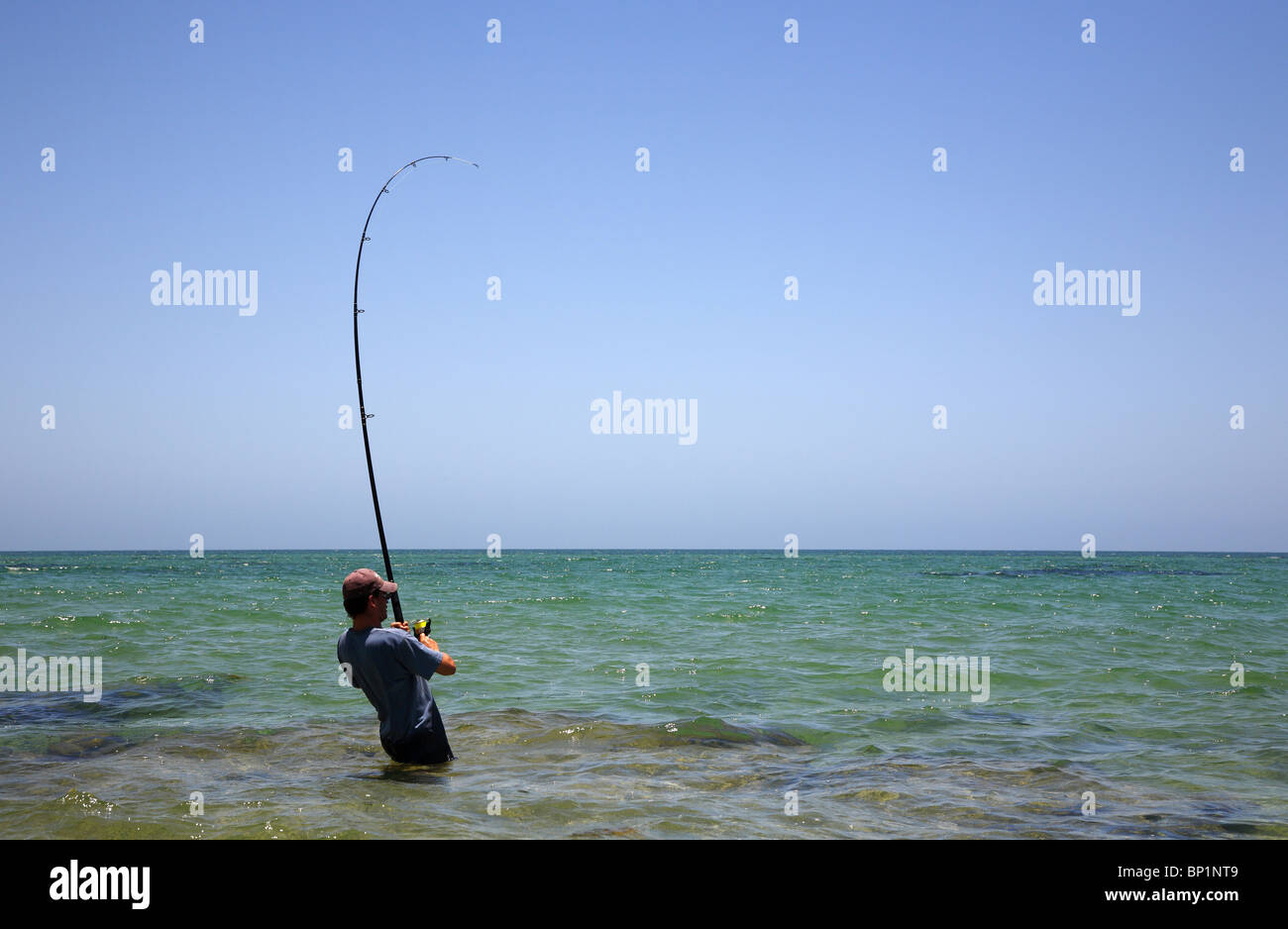A fisherman in the Indian Ocean, Denham, Australia Stock Photo - Alamy