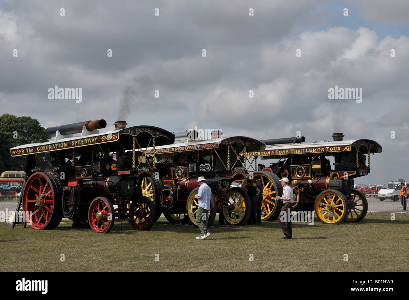 some people admiring the steam engines at the kemble steam rally 2010 ...