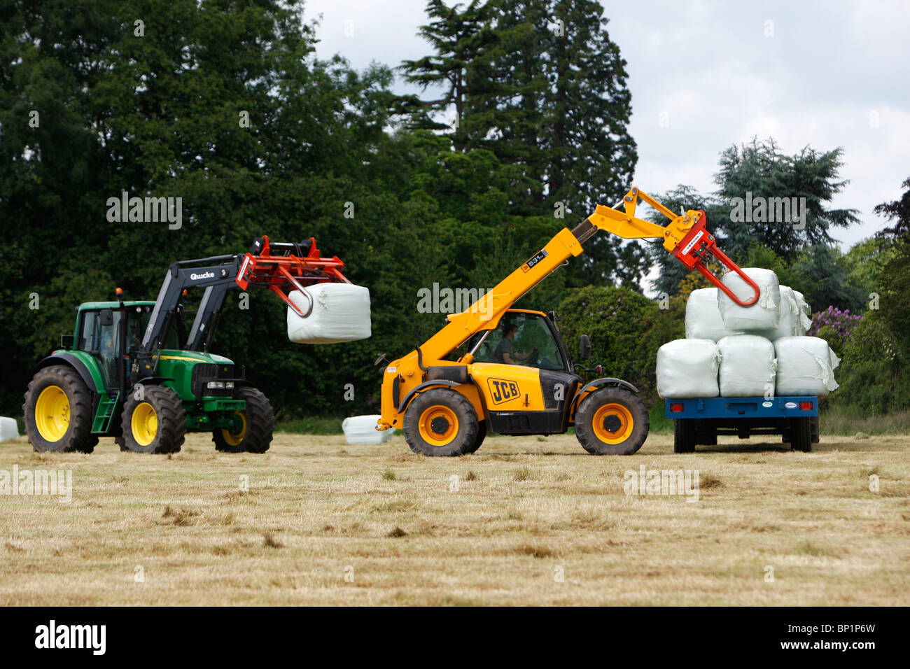 Haylage bale making for horse feed in the Chiltern Hills, South ...
