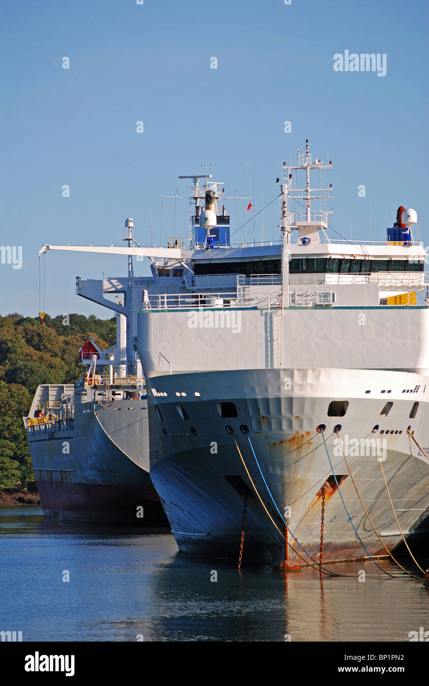 cargo ships and tankers laid up in deep water on the river fal near ...