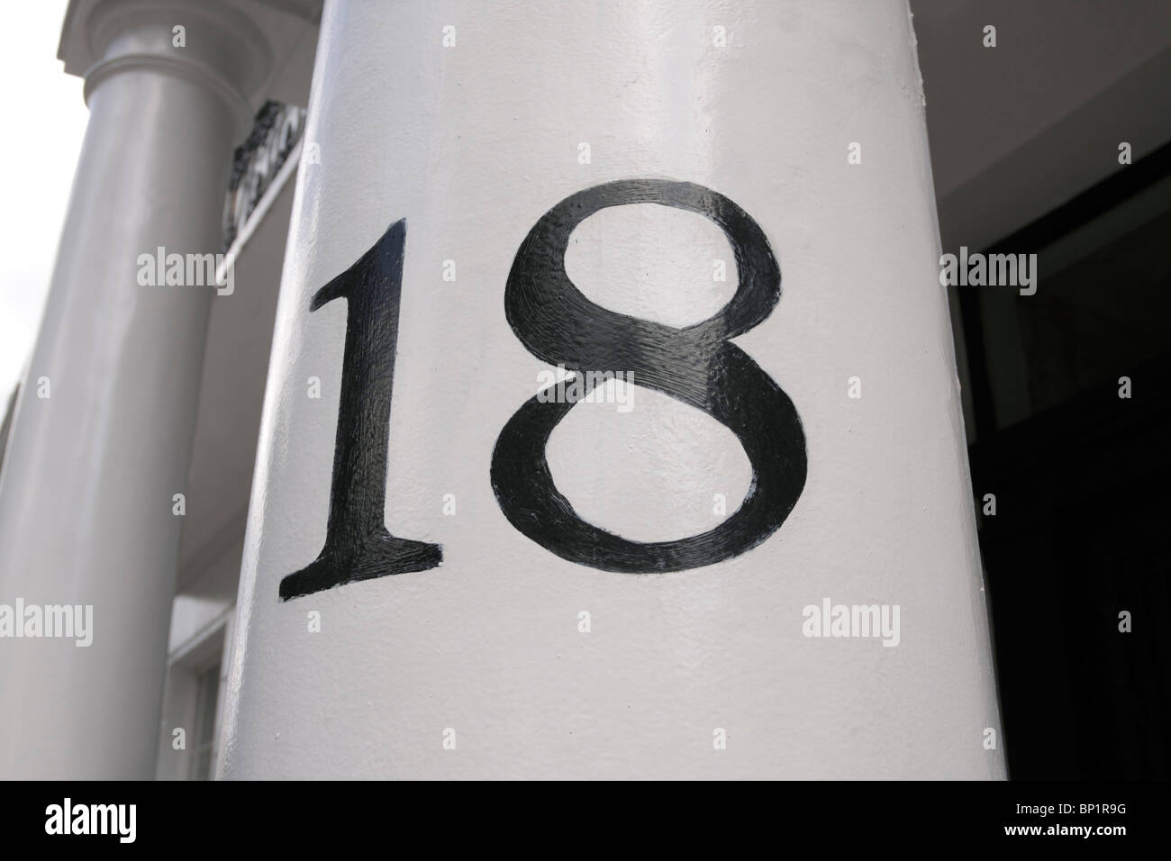 Close up of house numbers on pillar, London, UK Stock Photo - Alamy