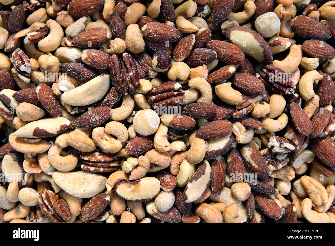 Large pile of fancy mixed nuts Stock Photo - Alamy
