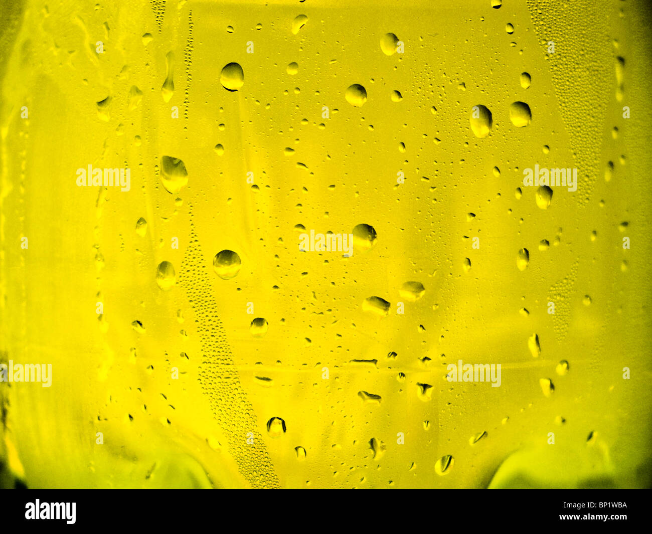 Yellow liquid splash in air hi-res stock photography and images - Alamy