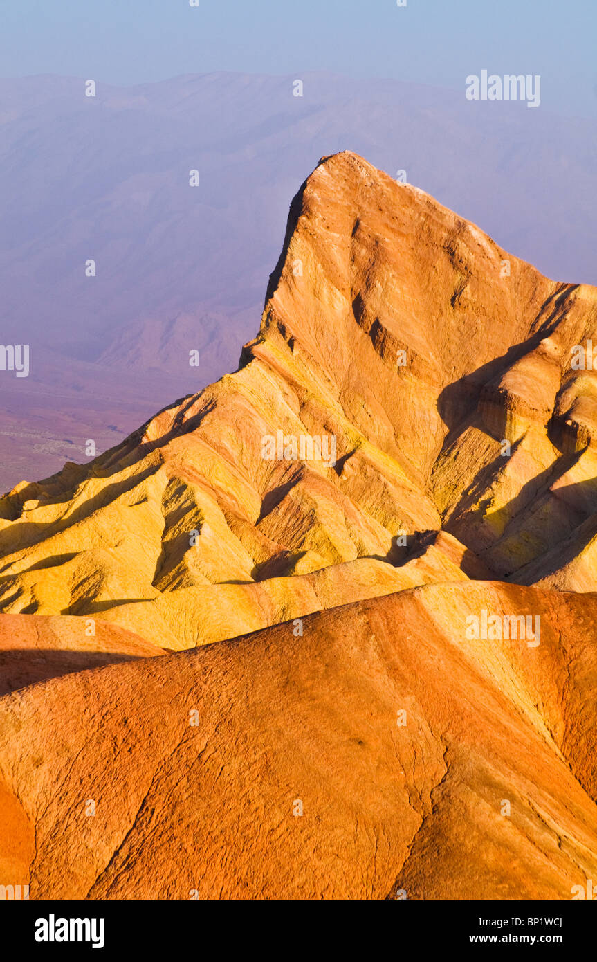 Dawn light on Manly Beacon from Zabriskie Point, Death Valley National ...