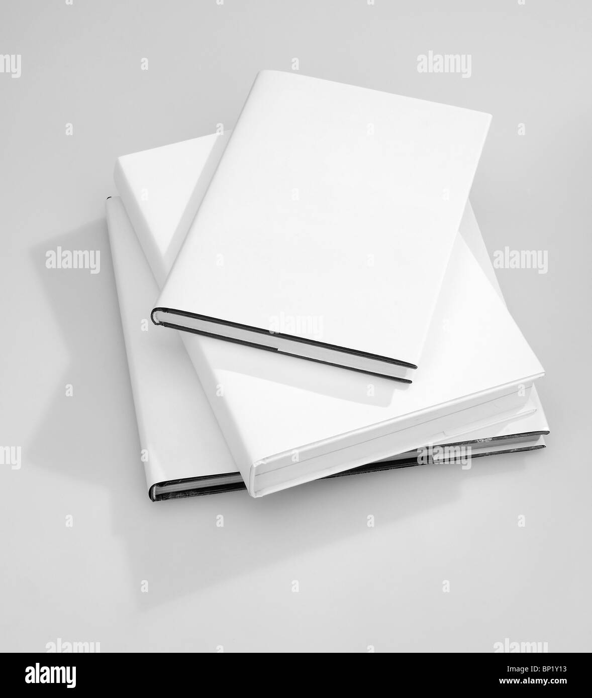 Three Blank book cover white Stock Photo - Alamy