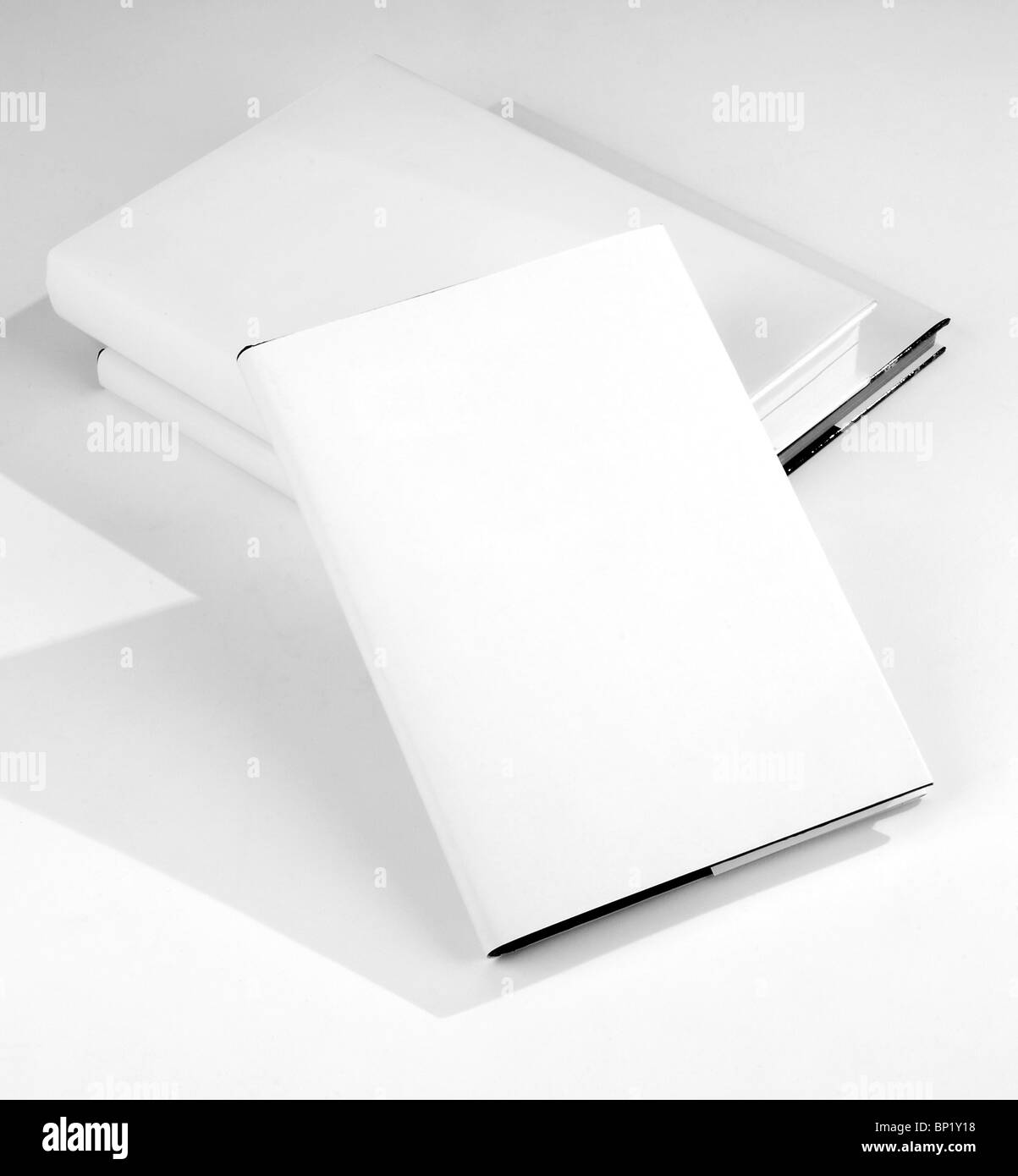 Three Blank book cover white Stock Photo - Alamy