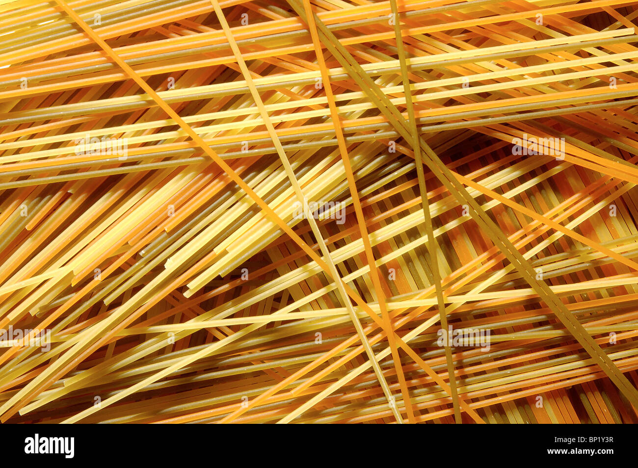 Texture of the various colors of spaghetti Stock Photo - Alamy