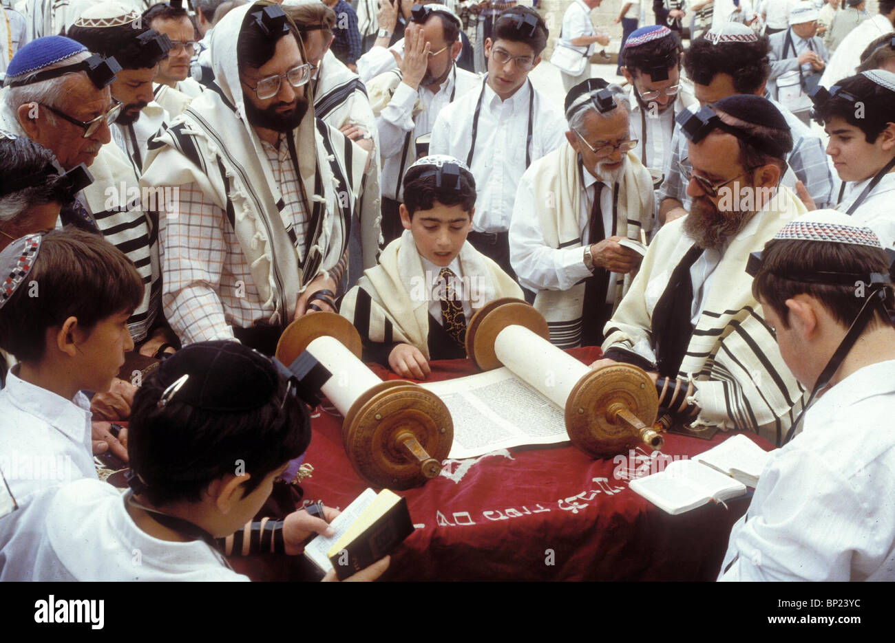 HAVING REACHED THE AGE OF 13 A JEWISH BOY READS A PASSAGE FROM THE ...