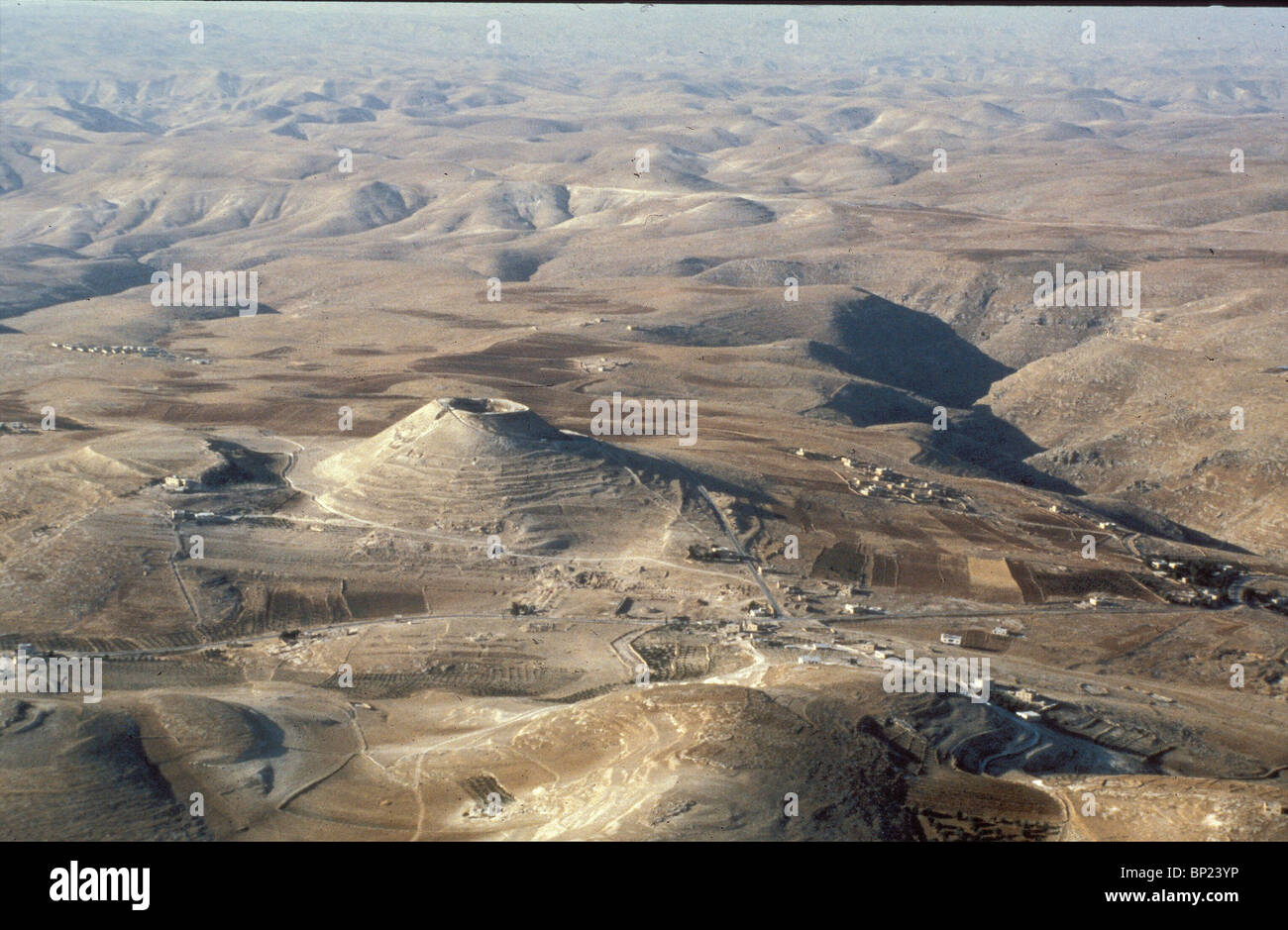 HERODIUM LOCATED IN THE JUDEAN DESERT EAST OF BETHLECHEM. THE FORTRESS ...