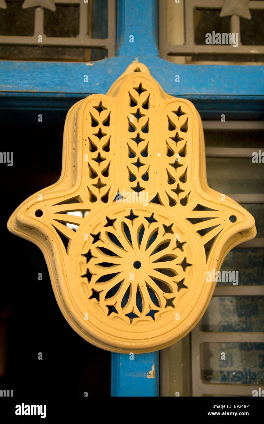 A ceramic Hand of Fatima is displayed for sale at a pottery shop in the ...