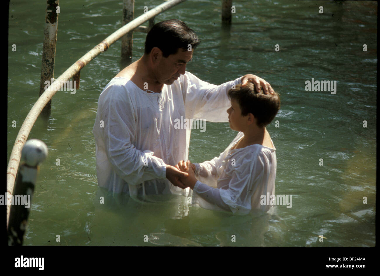 593. BAPTIZING CEREMONY IN THE RIVER JORDAN Stock Photo - Alamy