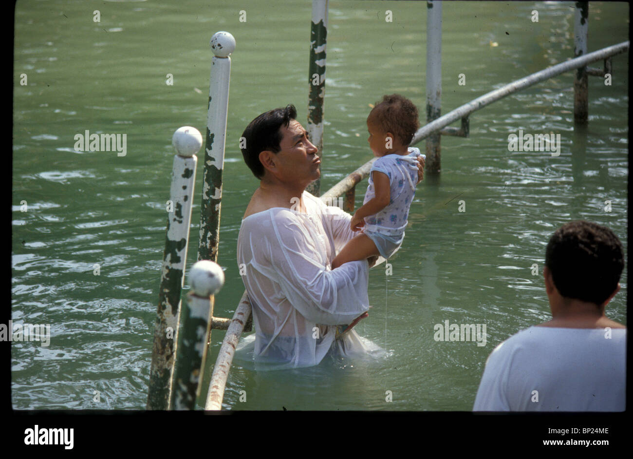 Baptizing hi-res stock photography and images - Alamy