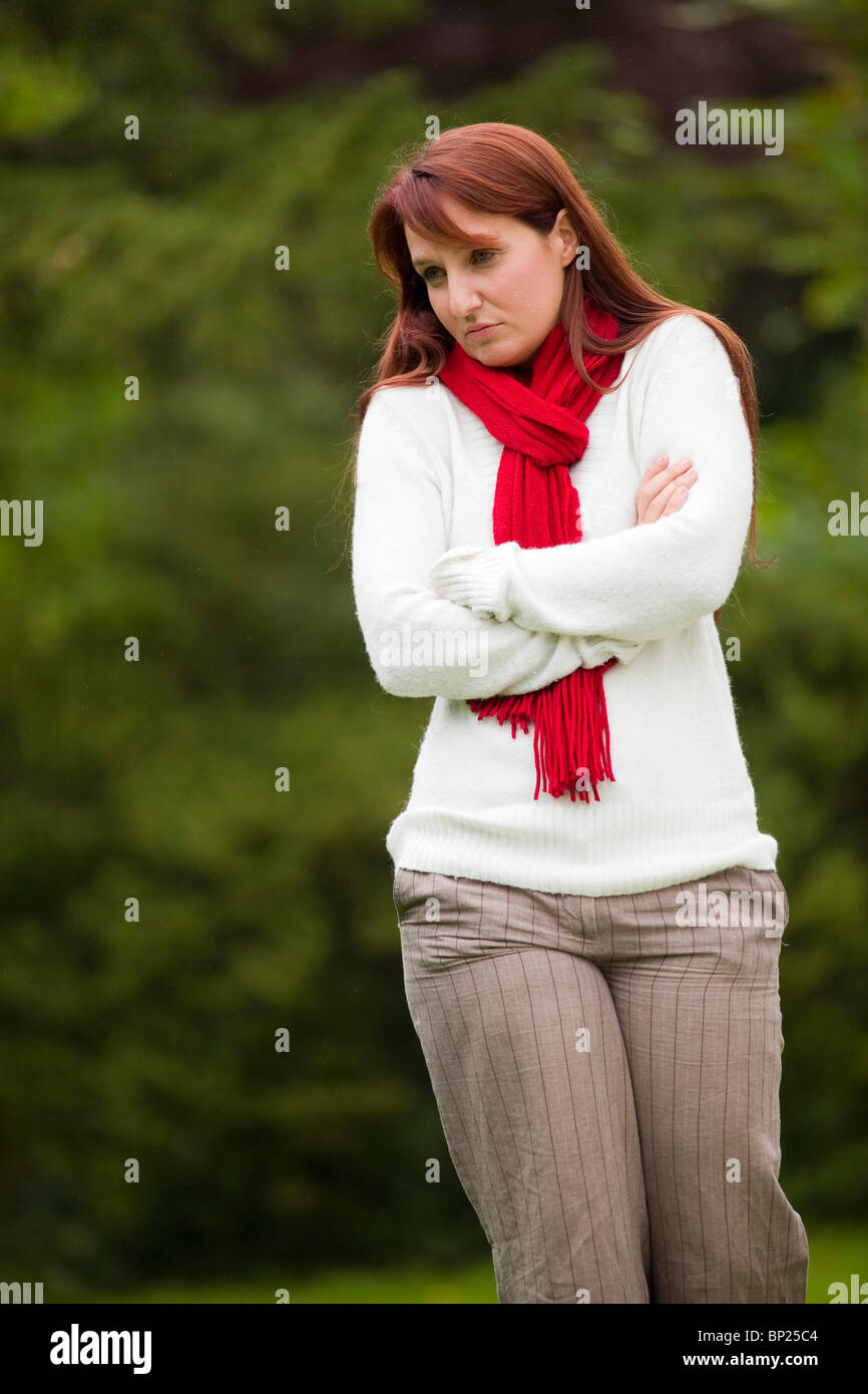 Woman walking outdoors Stock Photo - Alamy