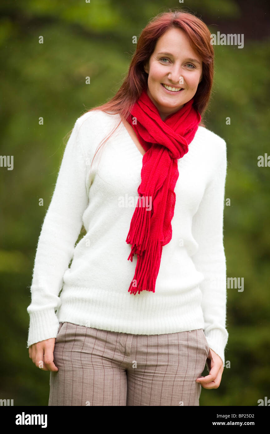 Woman walking outdoors Stock Photo - Alamy