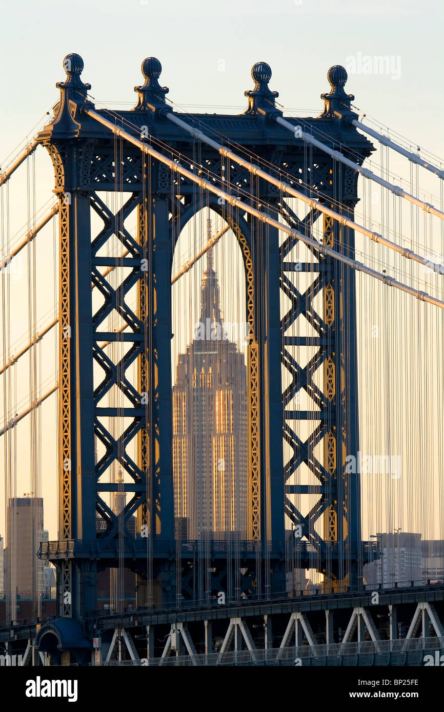 Empire State Building seen through Manhattan Bridge at Sunset Stock ...