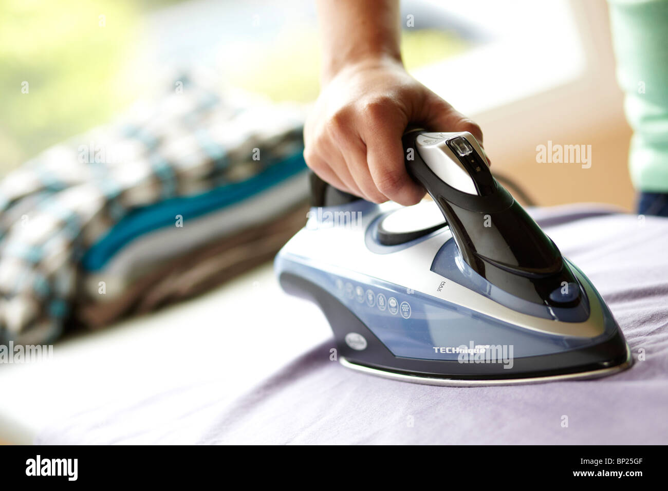 Do the ironing hi-res stock photography and images - Alamy