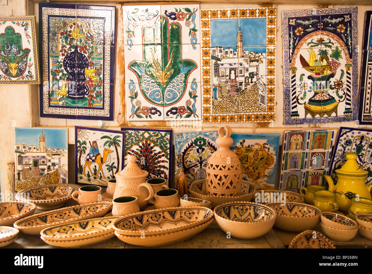 Traditional pottery is displayed in a shop the village of Guellala on ...