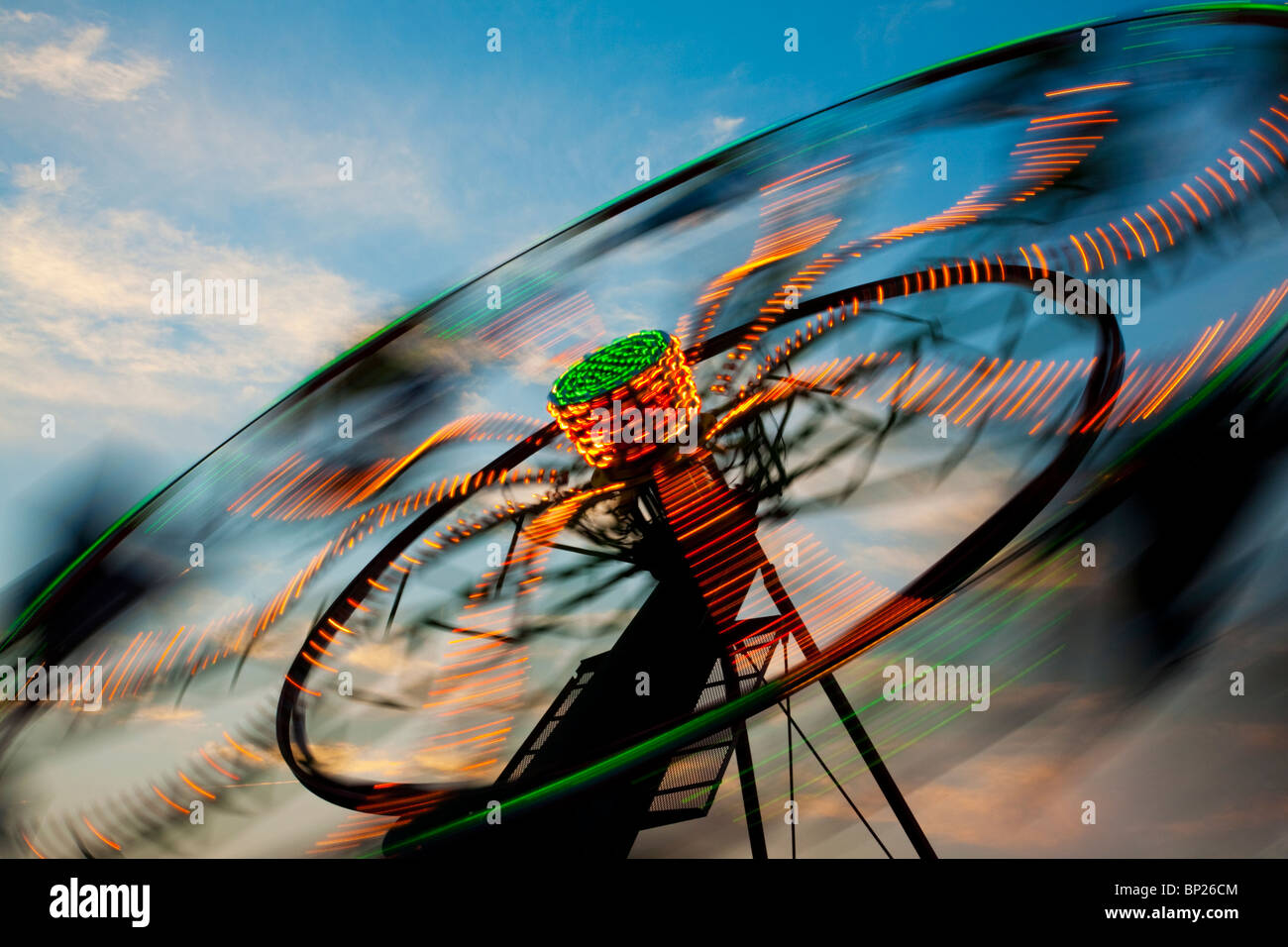 Amusement Rides with Movement Blur in the evening at the Kentucky State ...