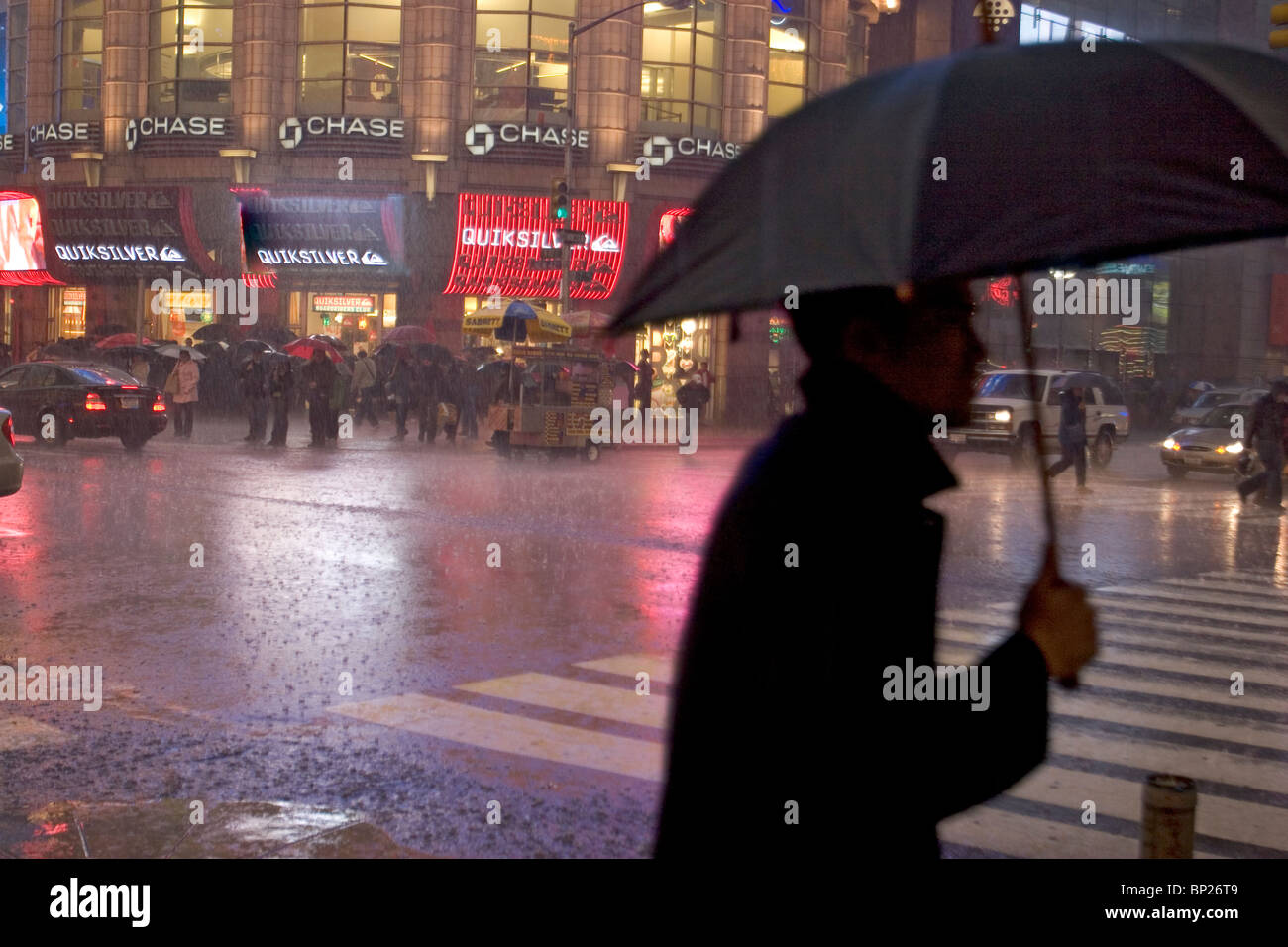 A rainy day in the Times Square area of Manhattan around 42nd Street ...