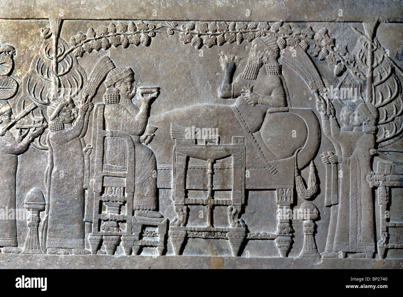 ASSYRIAN KING ASHURBANIPAL & HIS QUEEN FEASTING IN THEIR COURT IN ...