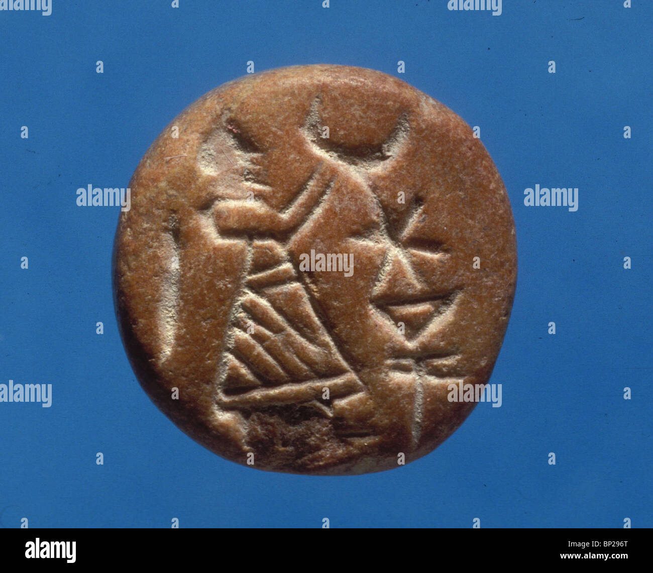 LIMESTONE SEAL DATING FROM C. 8TH. C. B.C. DEPICTING A PERSON ...
