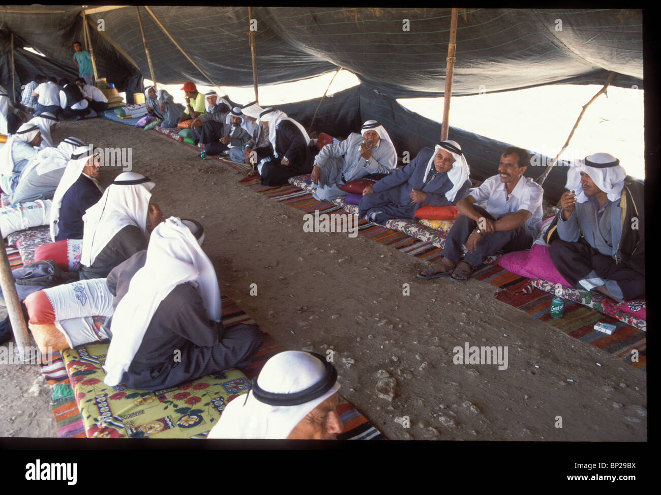 WEDDING IN A BEDWI TENT IN THE NEGEV. THE GROOM & HIS MALE GUESTS ...
