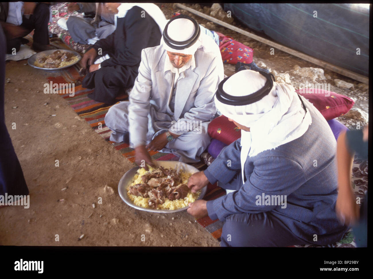 WEDDING IN A BEDWI TENT IN THE NEGEV. THE GROOM & HIS MALE GUESTS ...