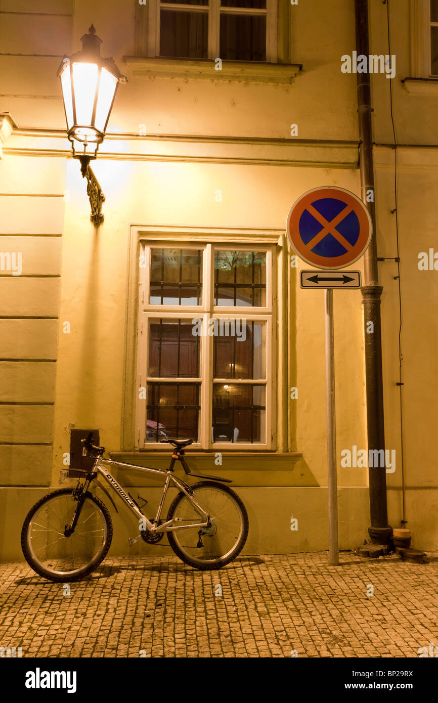 Bicycle resting against Stock Photo - Alamy