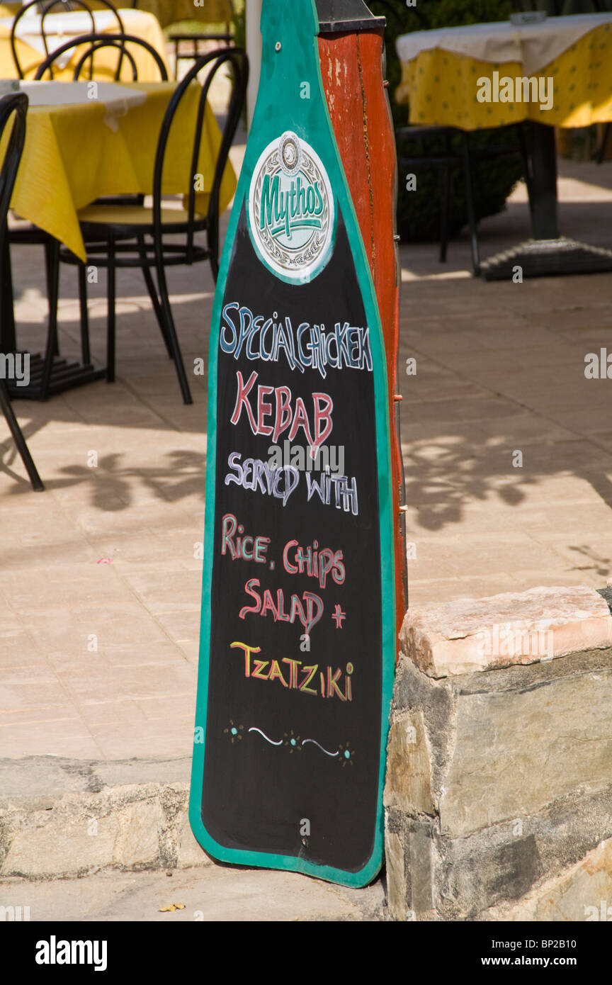Signs outside taverna in Sidari on the Greek island of Corfu Greece GR ...