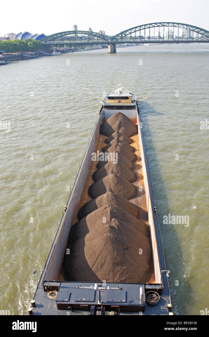 Barge loaded with aggregates sailing on the river Rhine, Cologne, North ...
