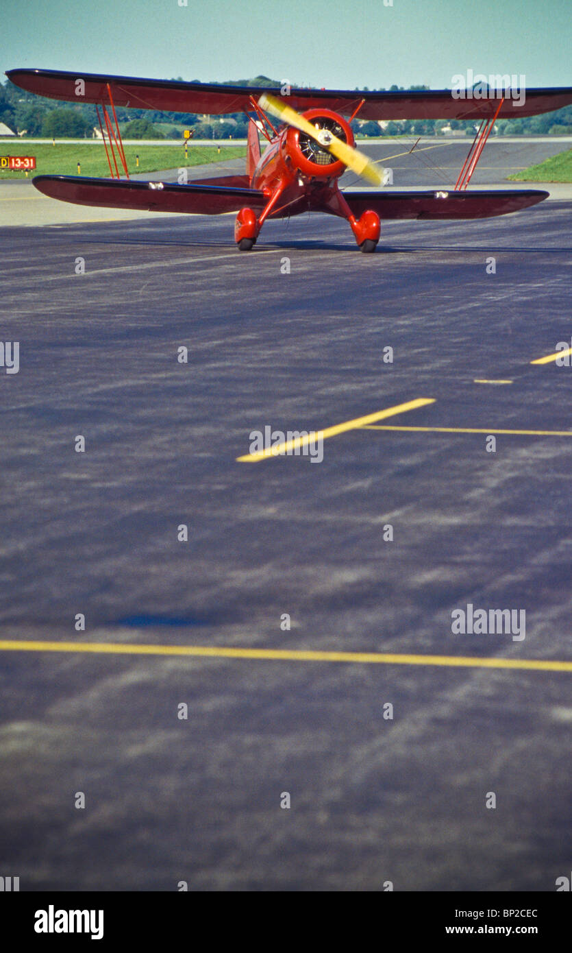 Antique twin winged plane lands at airshow Stock Photo - Alamy